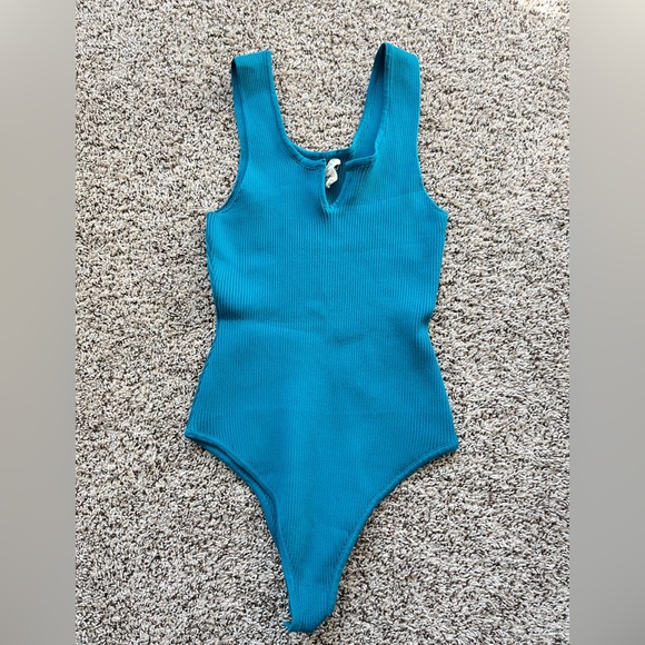 Tops | Ribbed Body Hugging Bodysuit | Poshmark